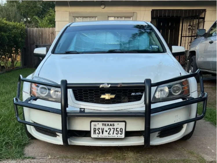 2014 Chevrolet Caprice with 20x8.5 38 Ravetti M13 and 255/35R20 Nitto ...