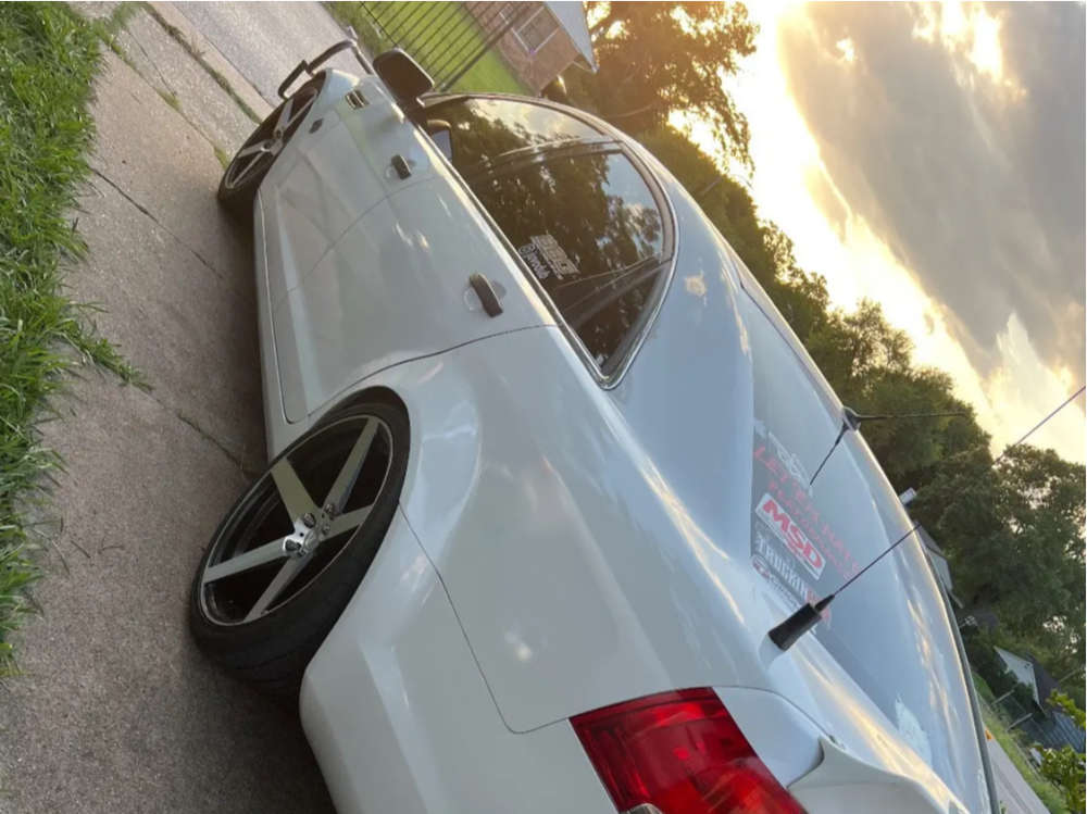 2014 Chevrolet Caprice with 20x8.5 38 Ravetti M13 and 255/35R20 Nitto ...