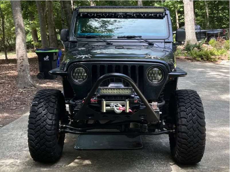 2001 Jeep TJ with 15x7 -6 American Racing Outlaw Ii and 35/12.5R15 ...