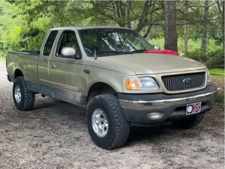 2000 Ford F-150 with 16x10 -38 Alloy Ion 171 and 305/70R16 Nitto Ridge ...