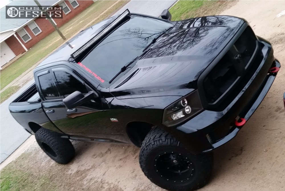 2014 Ram 1500 with 18x12 -44 Fuel Hostage and 37/12.5R18 Nitto Trail ...