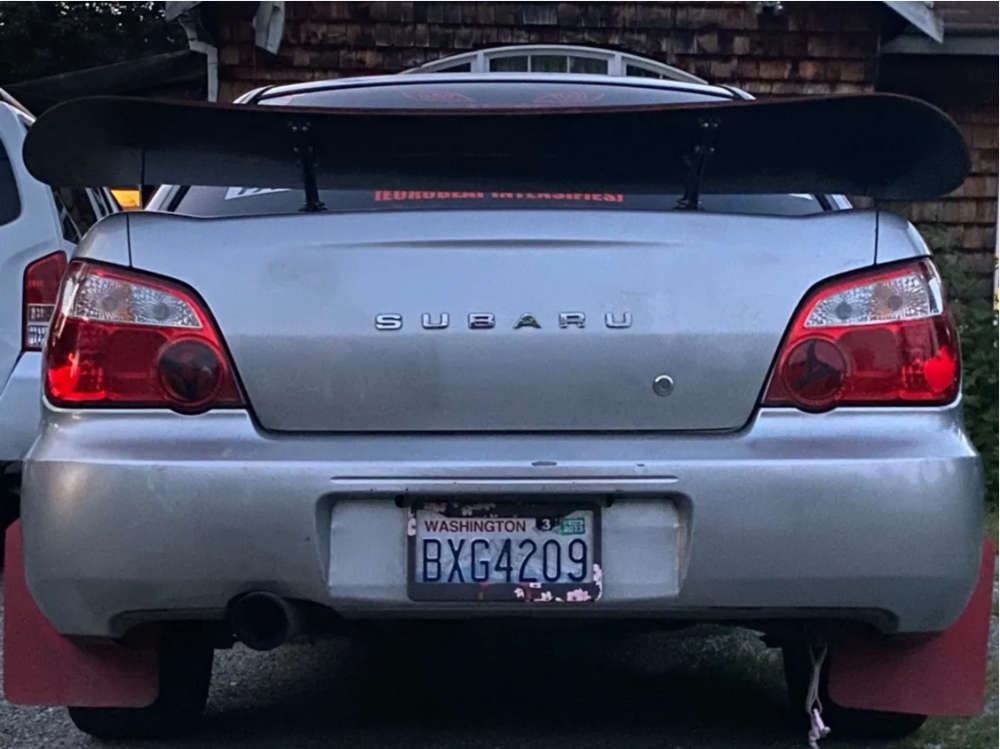 2004 Subaru Impreza with 16x7 48 Vision Cross and 205/55R16 Michelin ...