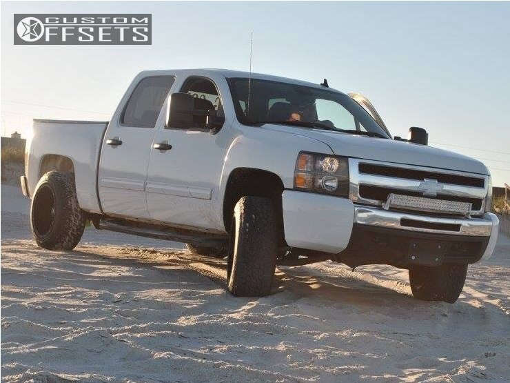 2011 Chevrolet Silverado 1500 with 20x12 -44 TIS 535B and 275/60R20 ...