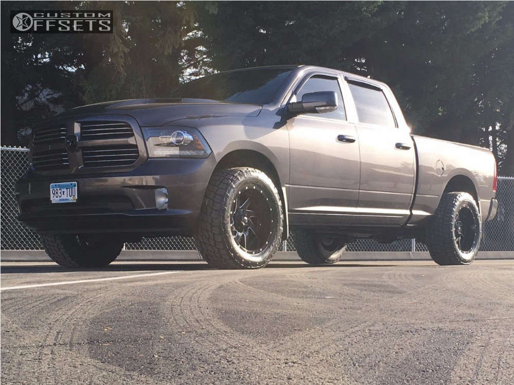 2015 Ram 1500 with 20x10 -19 Fuel Renegade and 305/55R20 Nitto Terra ...
