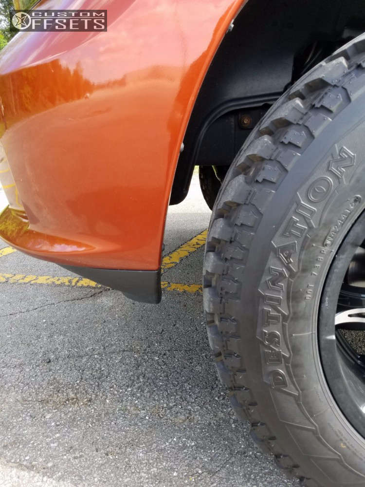 2013 Ram 1500 with 20x10 -25 Vision Manic and 275/65R20 Firestone Destination MT2 and Leveling ...