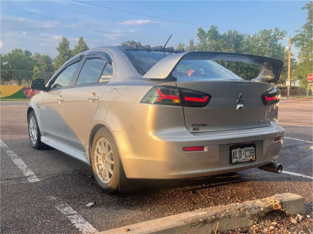 2014 Mitsubishi Lancer with 16x7 40 Maxxim Winner and 205/60R16 Toyo ...
