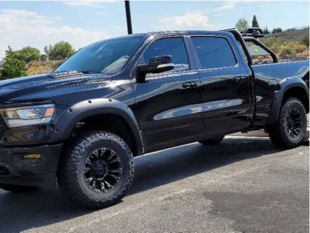 2019 Ram 1500 with 18x9 1 Fuel Vapor and 35/12.5R18 Nitto Recon ...