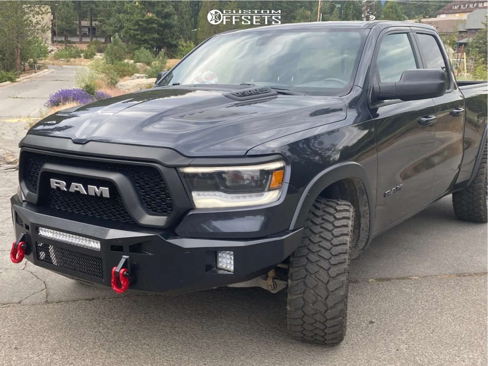 2019 Ram 1500 with 20x10 -19 TIS 554BM and 33/12.5R20 Firestone ...