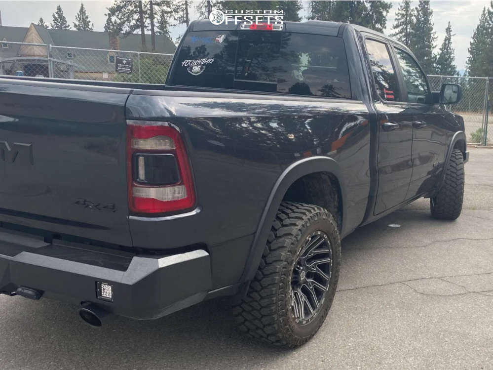 2019 Ram 1500 with 20x10 -19 TIS 554BM and 33/12.5R20 Firestone ...