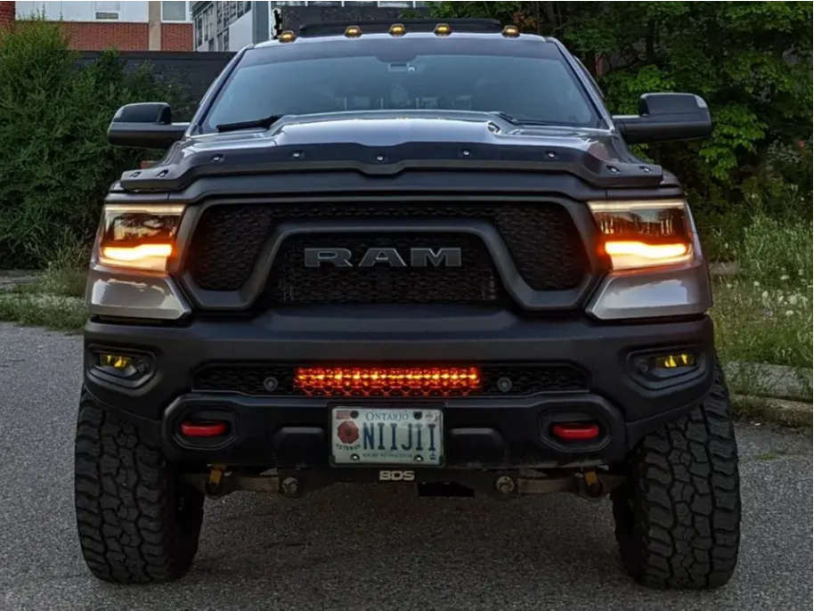 2019 Ram 1500 with 20x10 -12 Impact 809gbr and 35/12.5R20 Mickey ...