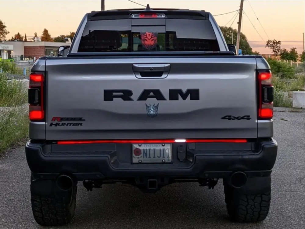 2019 Ram 1500 with 20x10 -12 Impact 809gbr and 35/12.5R20 Mickey ...