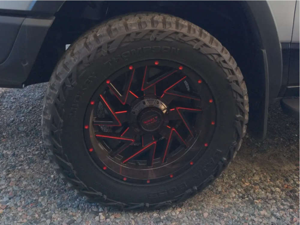 2019 Ram 1500 with 20x10 -12 Impact 809gbr and 35/12.5R20 Mickey ...