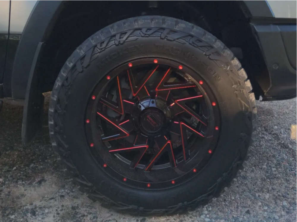 2019 Ram 1500 with 20x10 -12 Impact 809gbr and 35/12.5R20 Mickey ...