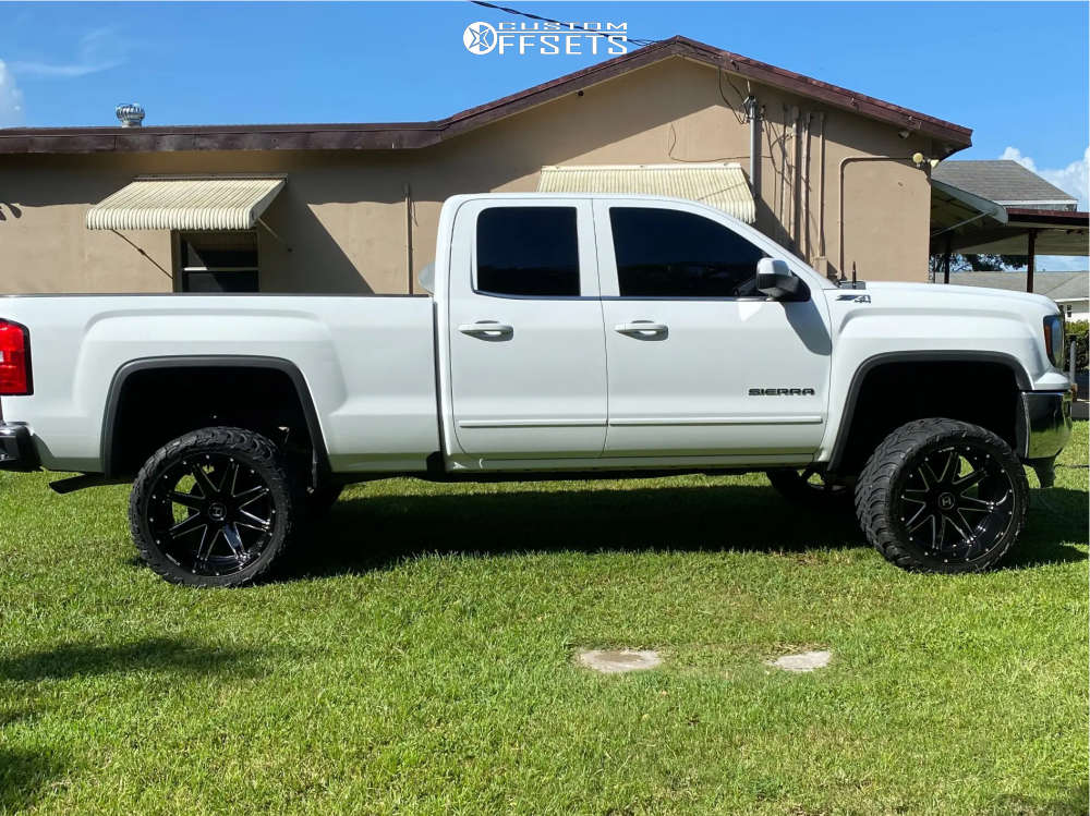2017 GMC Sierra 1500 with 22x12 -44 Hostile Alpha and 33/14.5R22 AMP Mud Terrain Attack Mt A and ...