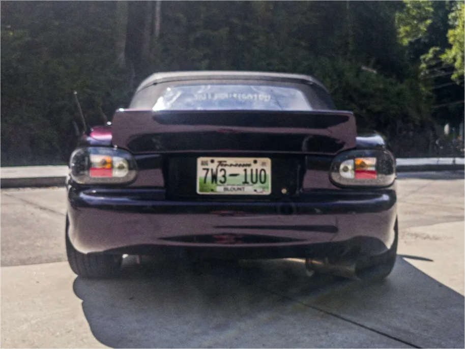 2002 Mazda Miata with 15x8 25 MST Mt10 and 205/45R15 Yokohama Advan ...