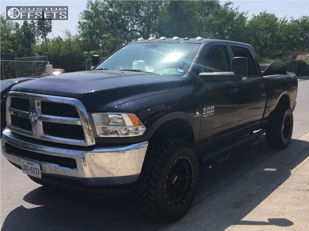 2014 Ram 2500 with 20x10 -24 Helo He900 and 295/65R20 Nitto Trail ...