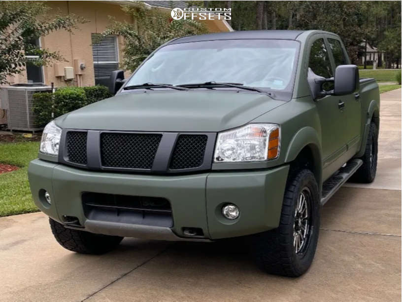 2005 Nissan Titan with 20x9 0 Hostile H127 and 33/12.5R20 Nitto Recon ...