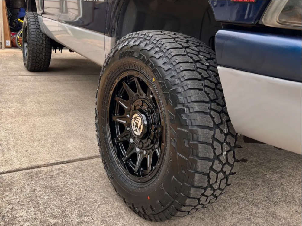 2000 Dodge Dakota with 17x9 -12 Anthem Off-Road Liberty and 265/70R17 ...