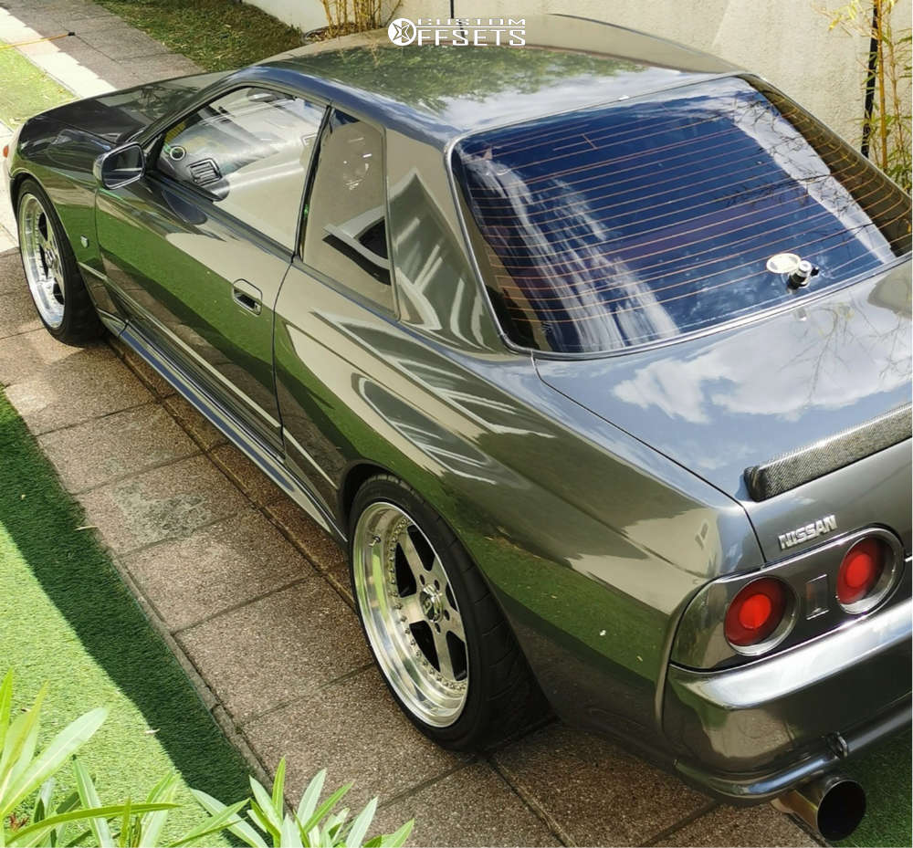 1991 Nissan Skyline with 18x10 24 Panasport G7 C5C and 265/35R18 Yokohama Advan Neova Ad08r and ...