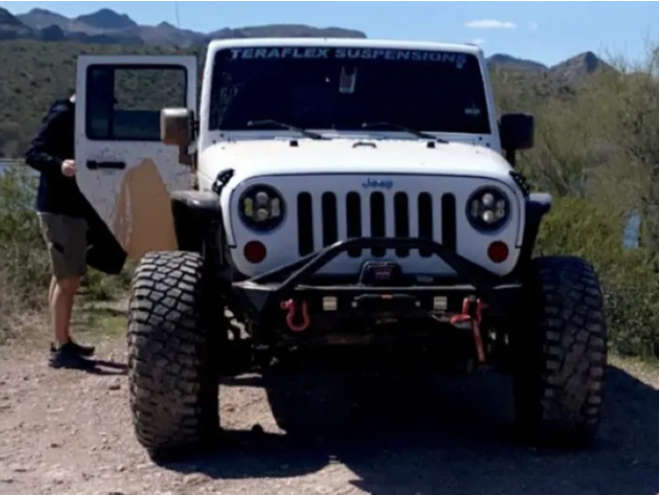 2012 Jeep Wrangler with 17x8.5 KMC Km235 and 37/12.5R17 BFGoodrich Mud ...