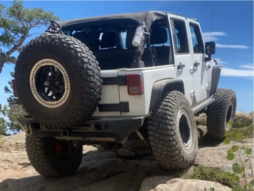 2012 Jeep Wrangler with 17x8.5 KMC Km235 and 37/12.5R17 BFGoodrich Mud ...