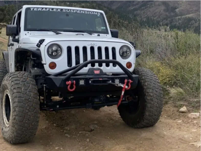 2012 Jeep Wrangler with 17x8.5 KMC Km235 and 37/12.5R17 BFGoodrich Mud ...