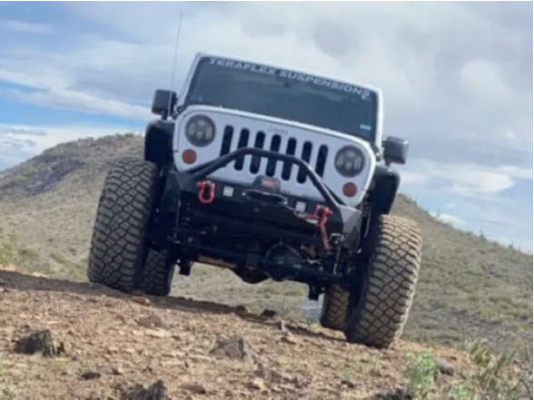 2012 Jeep Wrangler with 17x8.5 KMC Km235 and 37/12.5R17 BFGoodrich Mud ...