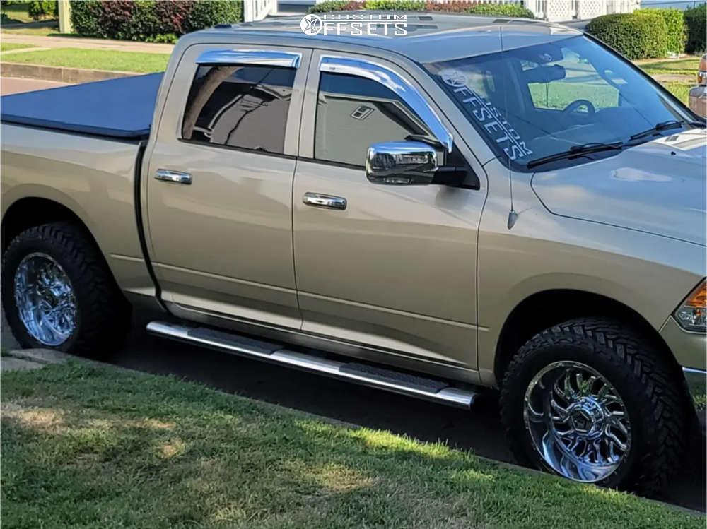 2011 Ram 1500 with 20x10 -25 TIS 544C and 33/12.5R20 Fuel Mud Gripper ...