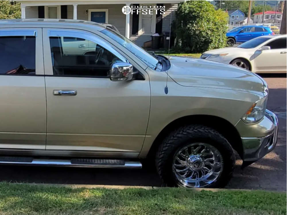 2011 Ram 1500 with 20x10 -25 TIS 544C and 33/12.5R20 Fuel Mud Gripper ...