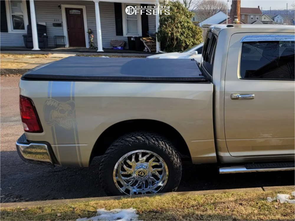 2011 Ram 1500 with 20x10 -25 TIS 544C and 33/12.5R20 Fuel Mud Gripper ...