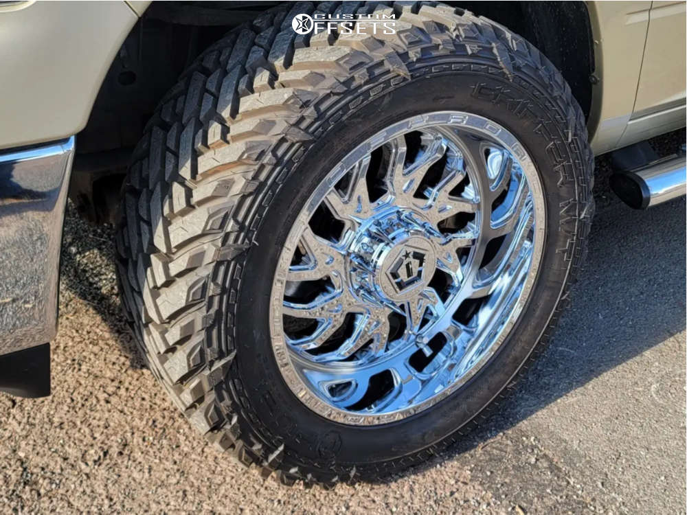 2011 Ram 1500 with 20x10 -25 TIS 544C and 33/12.5R20 Fuel Mud Gripper ...
