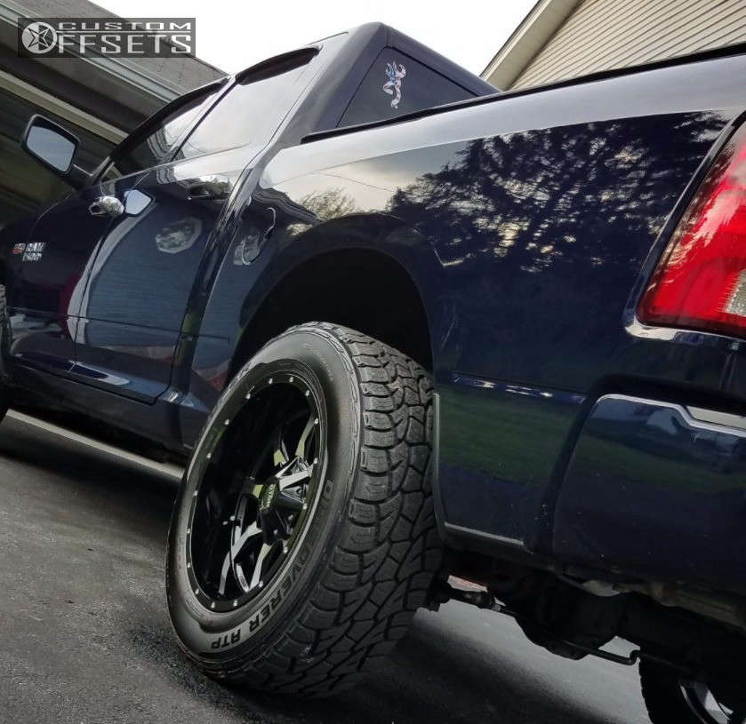 2014 Ram 1500 with 20x10 -24 Moto Metal Mo970 and 275/60R20 Cooper ...