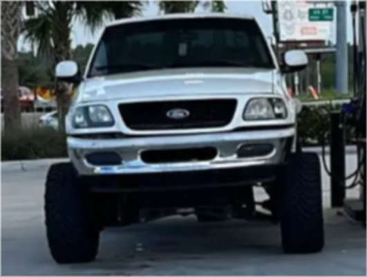 1999 Ford F-150 with 20x12 -57 Vision Spyder and 35/13.5R20 Venom Power ...