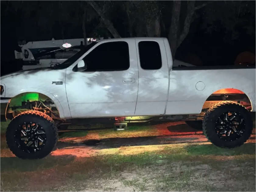 1999 Ford F-150 with 20x12 -57 Vision Spyder and 35/13.5R20 Venom Power ...