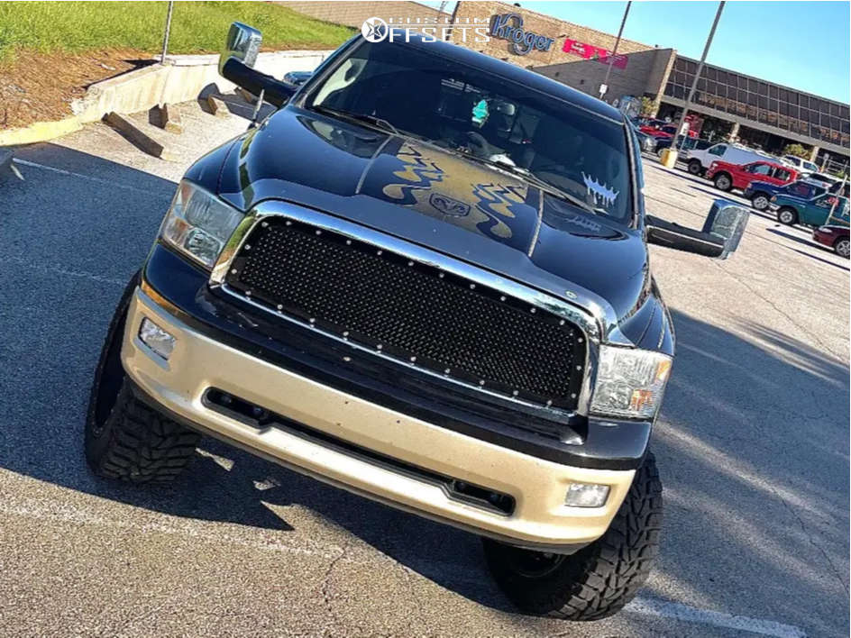 2011 Ram 1500 with 22x12 -50 Ballistic Tomahawk and 36/13.5R22 ...