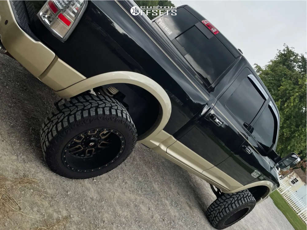 2011 Ram 1500 with 22x12 -50 Ballistic Tomahawk and 36/13.5R22 ...