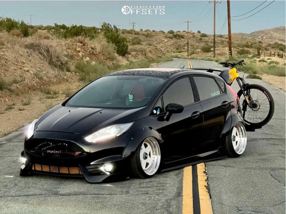 2015 Ford Fiesta with 17x9 4 Work Japan Monza Speed and 195 40R17 Accelera Phi R and Air Suspension Custom Offsets