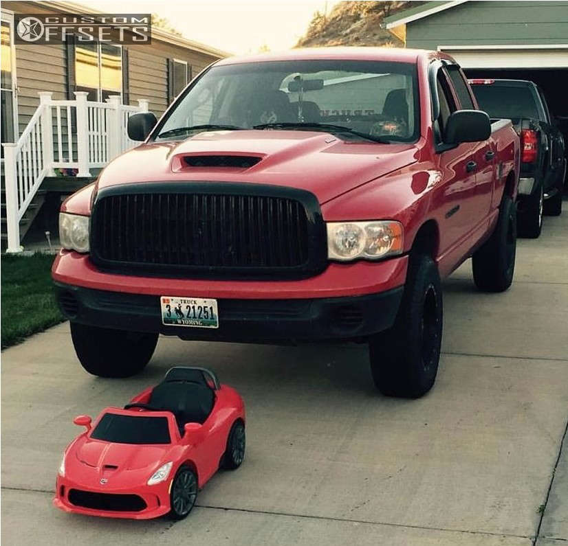 2005 Dodge Ram 1500 with 18x9 -12 Helo He879 and 265/70R18 Hankook ...