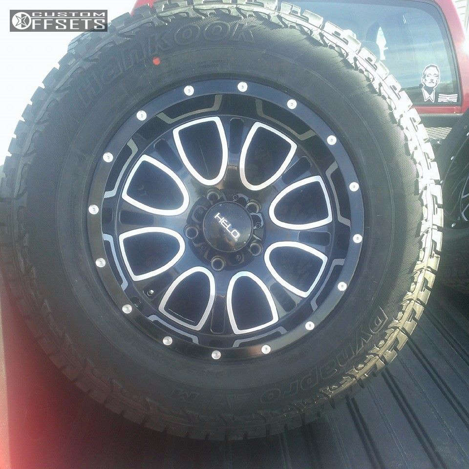 2005 Dodge Ram 1500 with 18x9 -12 Helo He879 and 265/70R18 Hankook ...