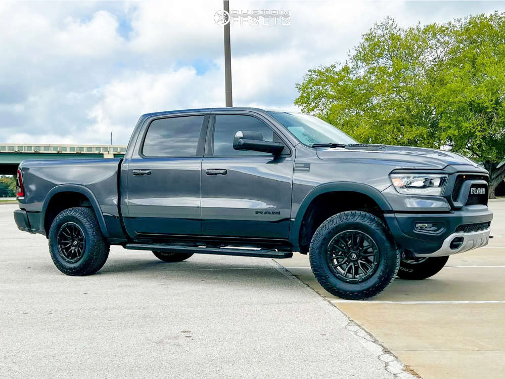 2020 Ram 1500 with 18x9 -12 Fuel Rebel and 275/65R18 Cooper Discoverer ...