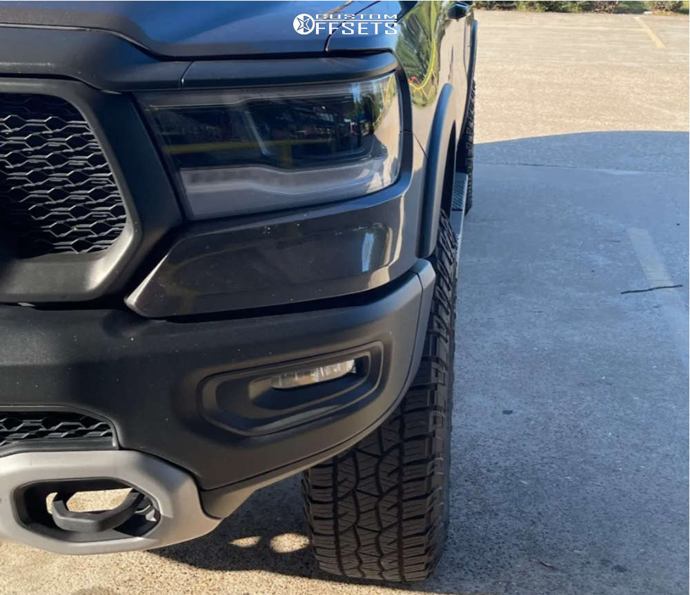 2020 Ram 1500 with 18x9 -12 Fuel Rebel and 275/65R18 Cooper Discoverer ...
