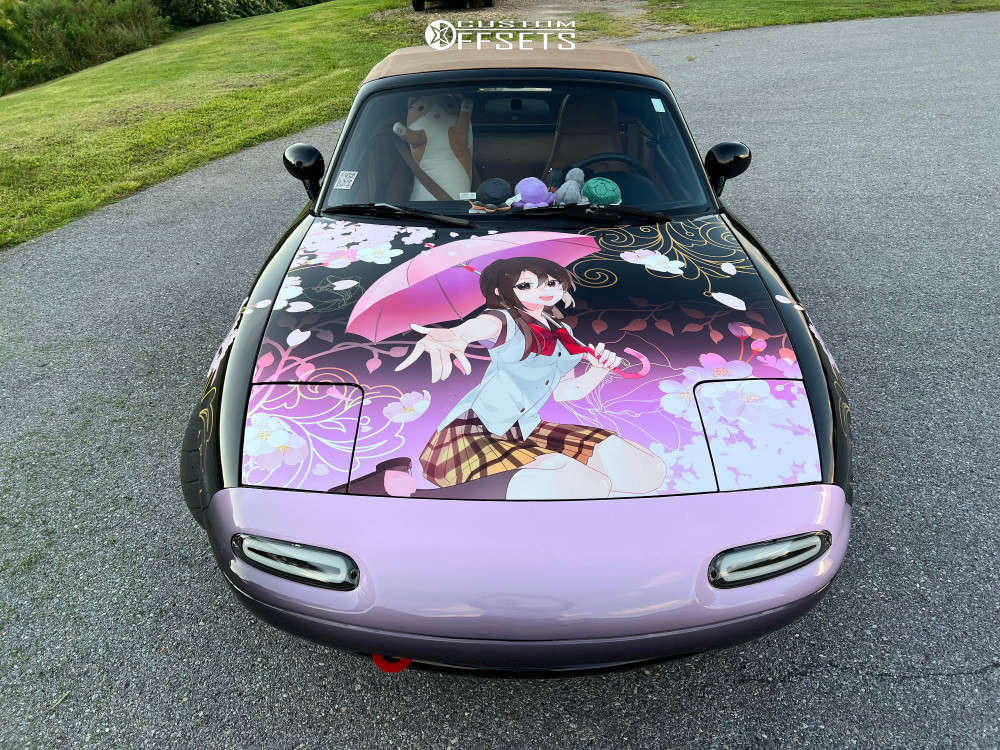 1996 Mazda Miata with 15x7.5 35 Konig Hypergram and 205/50R15 Nitto ...