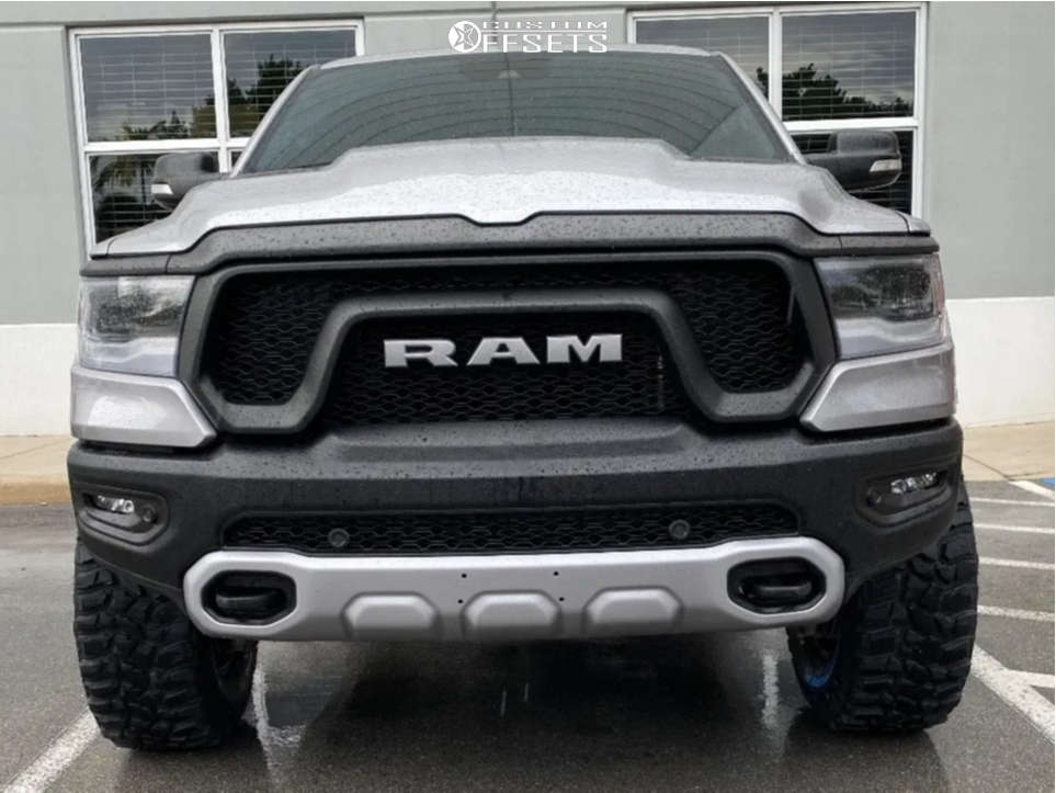2021 Ram 1500 with 18x9 1 Fuel Rebel and 305/70R18 Cooper Discoverer ...