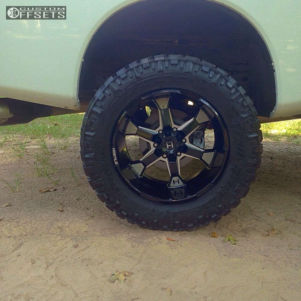 2010 Nissan Titan with 20x10 -20 Hostile Knuckles and 295/60R20 Nitto ...