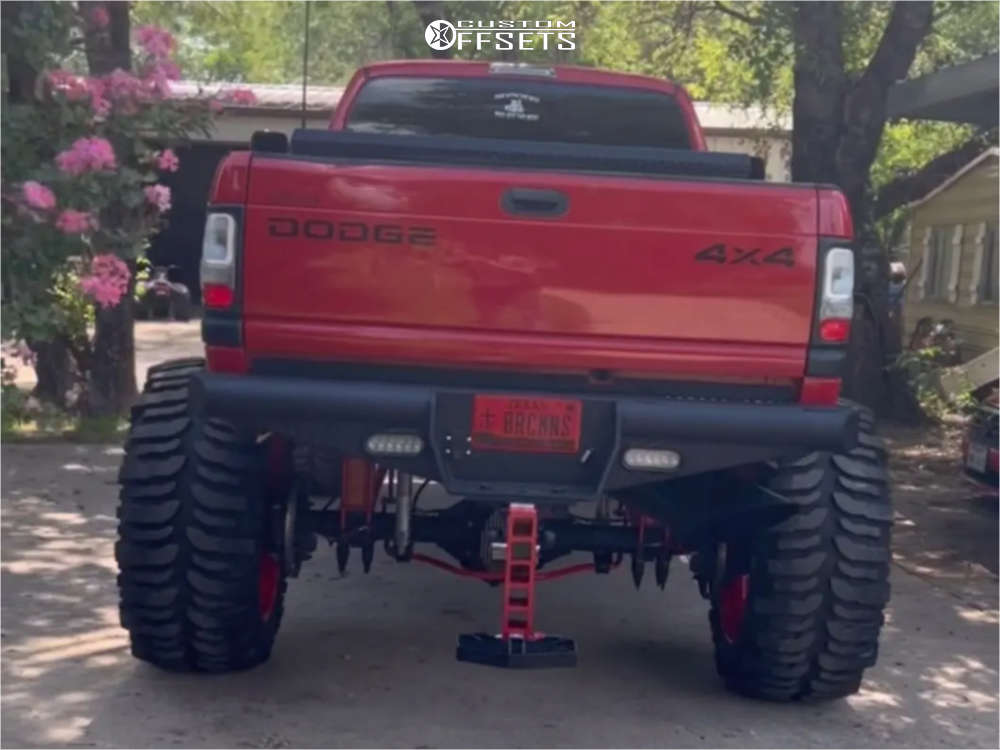 2001 Dodge Ram 2500 with 28x18 -117 Grid GF17 and 44/19.5R28 Interco ...