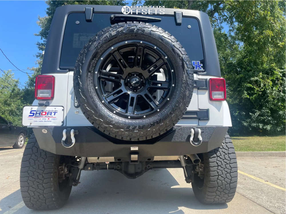 2017 Jeep Wrangler with 20x10 -24 Helo He900 and 305/55R20 Falken ...
