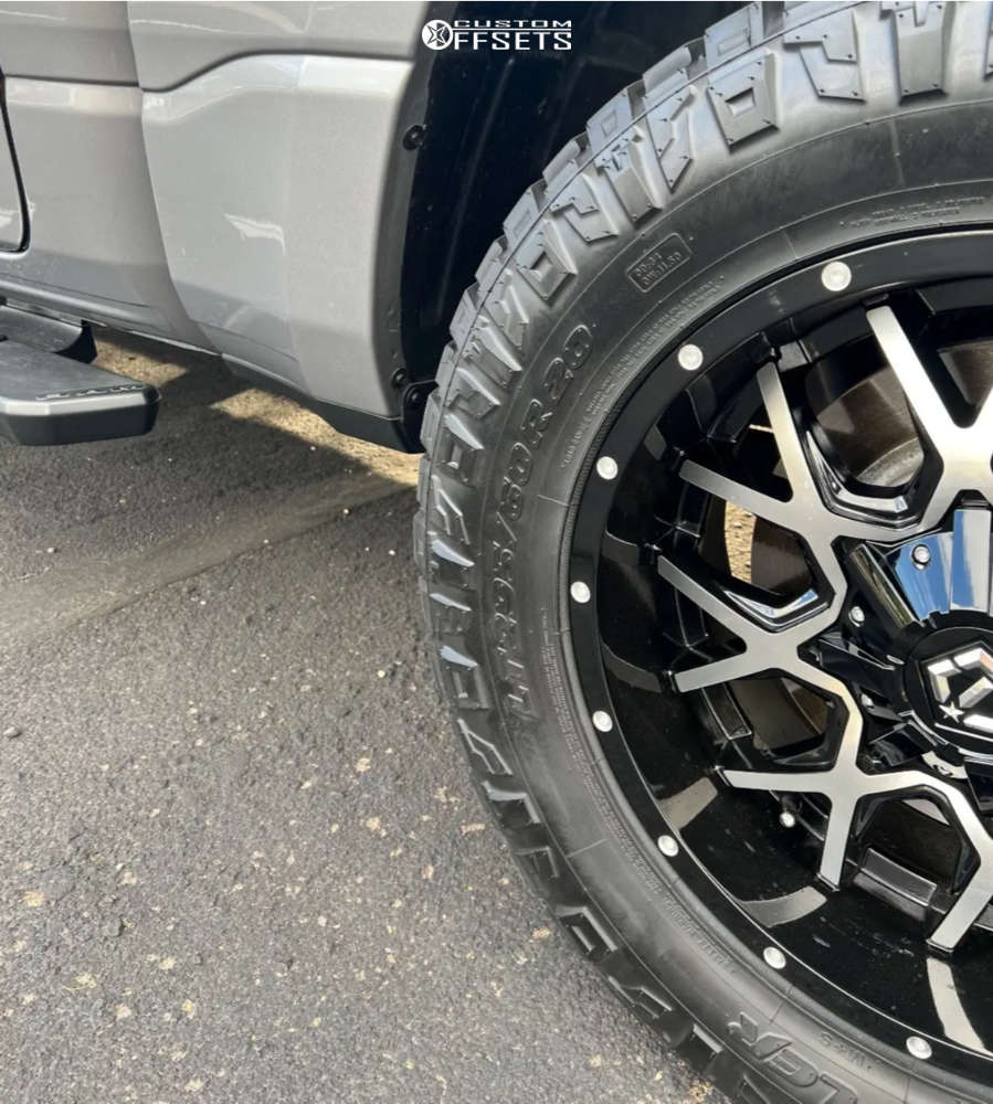 2019 Ram 1500 with 20x9 0 TIS 549MB and 295/60R20 Nitto Ridge Grappler and Stock | Custom Offsets