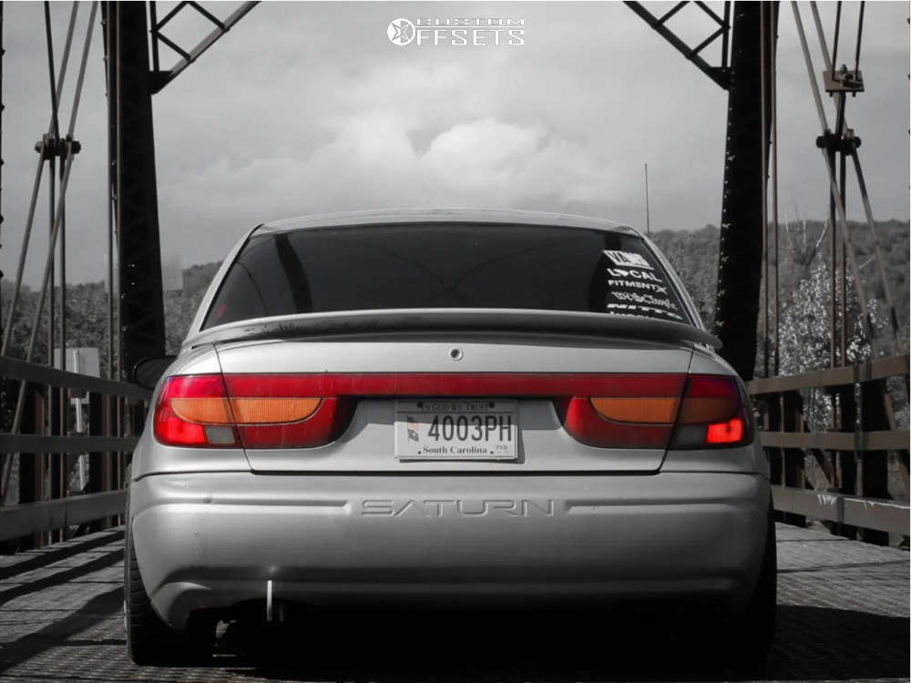 2002 Saturn SL2 with 16x8 20 ESM 002R and 205/40R16 Nitto Neo Gen and ...