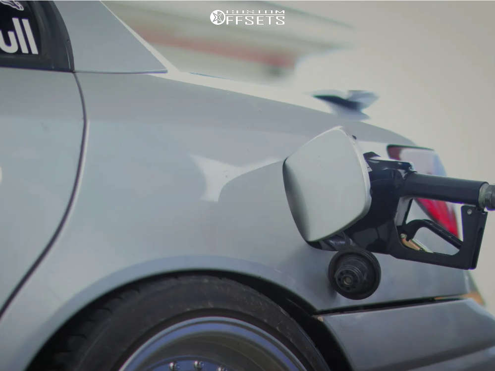 2002 Saturn SL2 with 16x8 20 ESM 002R and 205/40R16 Nitto Neo Gen and ...