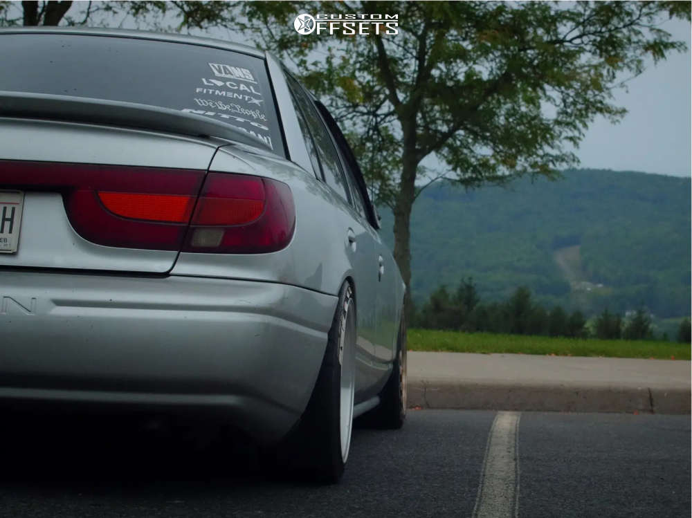 2002 Saturn SL2 with 16x8 20 ESM 002R and 205/40R16 Nitto Neo Gen and Coilovers | Custom Offsets